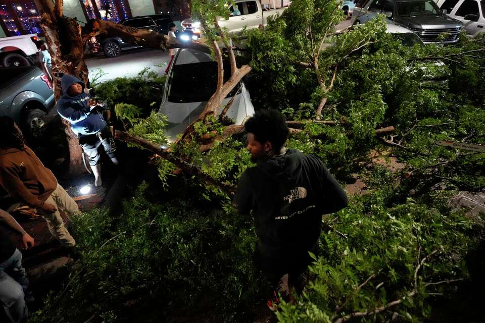 Houston rapper Trae tha Truth helps clear storm damage