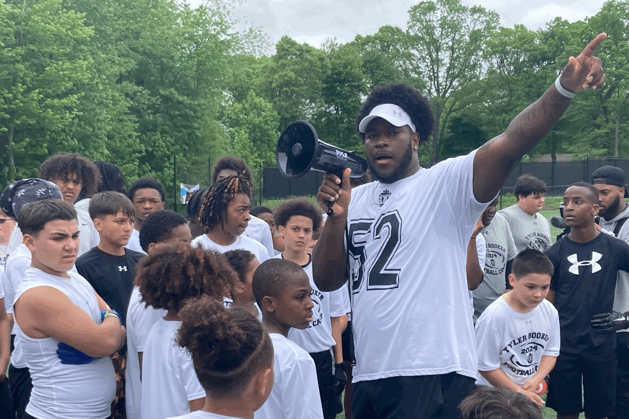 Alabama standout Tyler Booker hosts football camp in New Haven