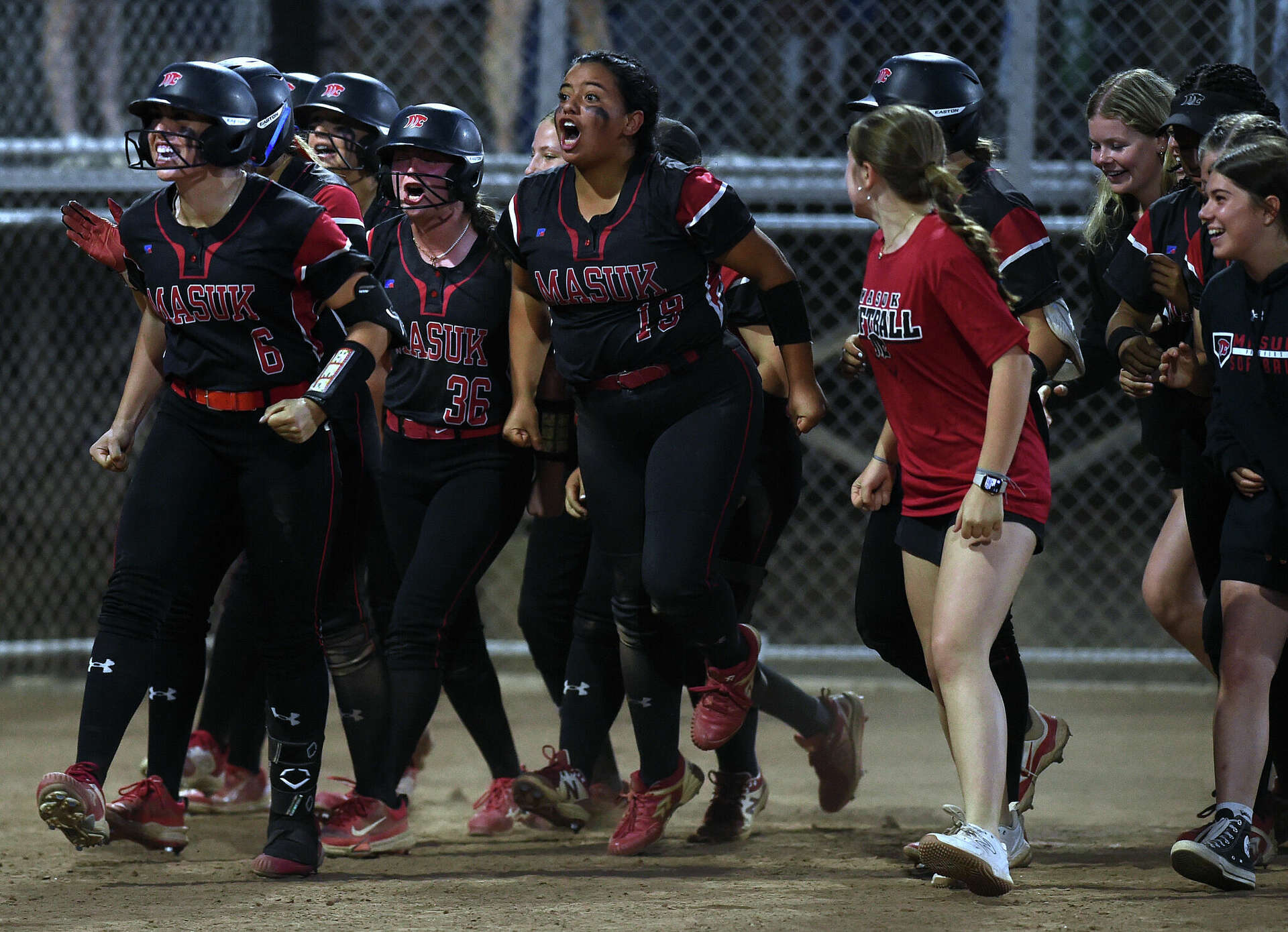 Masuk wins SWC softball title on Moretti's homer in 9th over Newtown