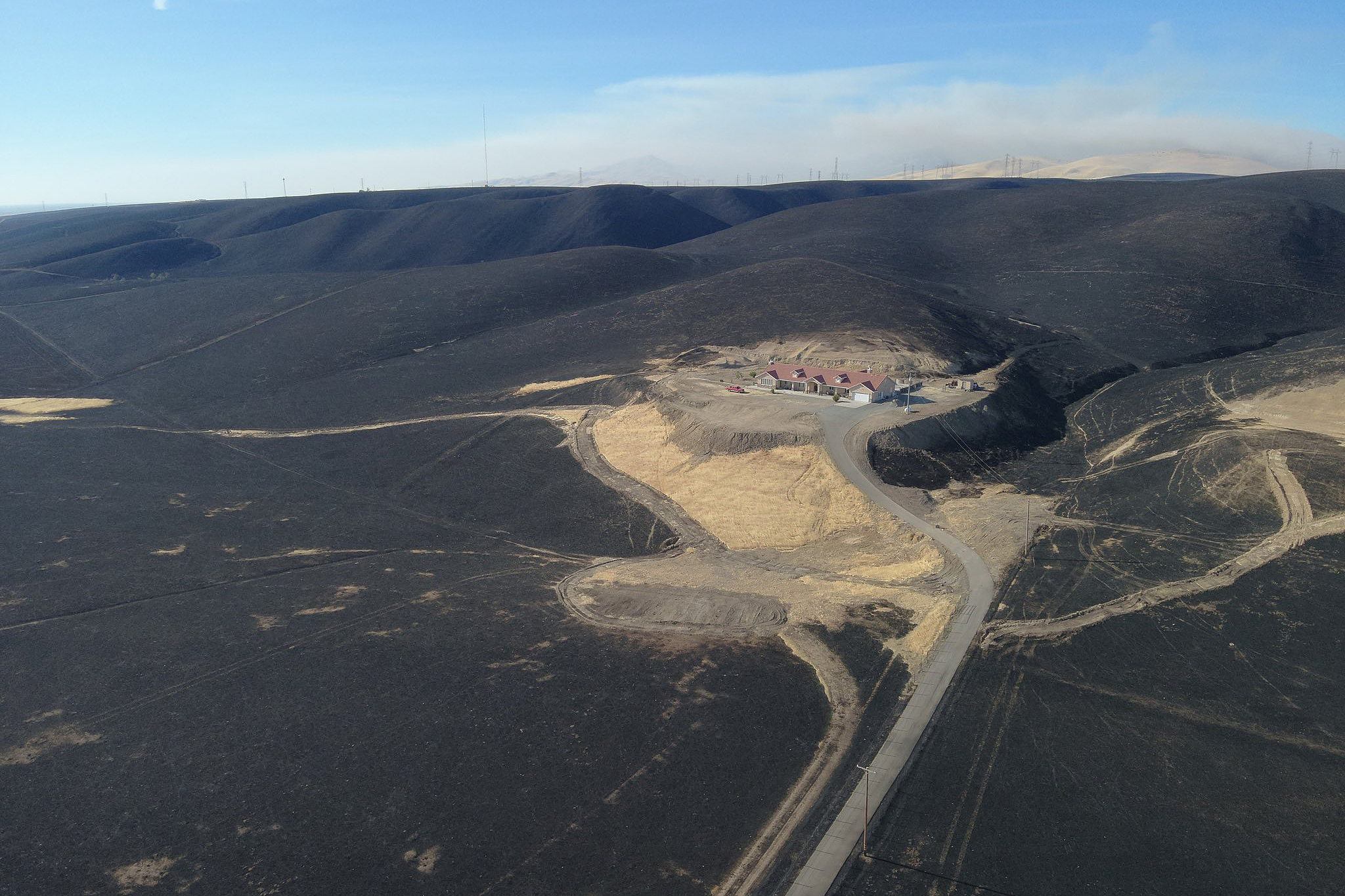 Video shows blackened landscape from 14,000-acre Corral Fire