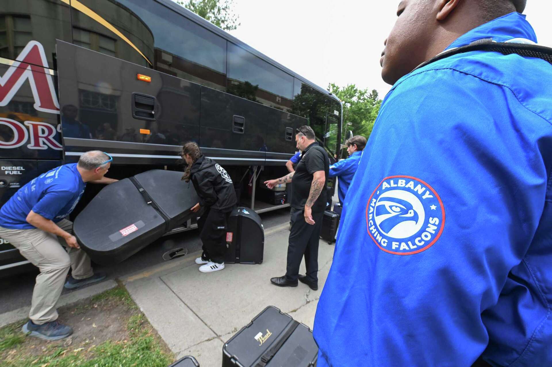 Albany marching band flies to France for historic D-Day ceremonies
