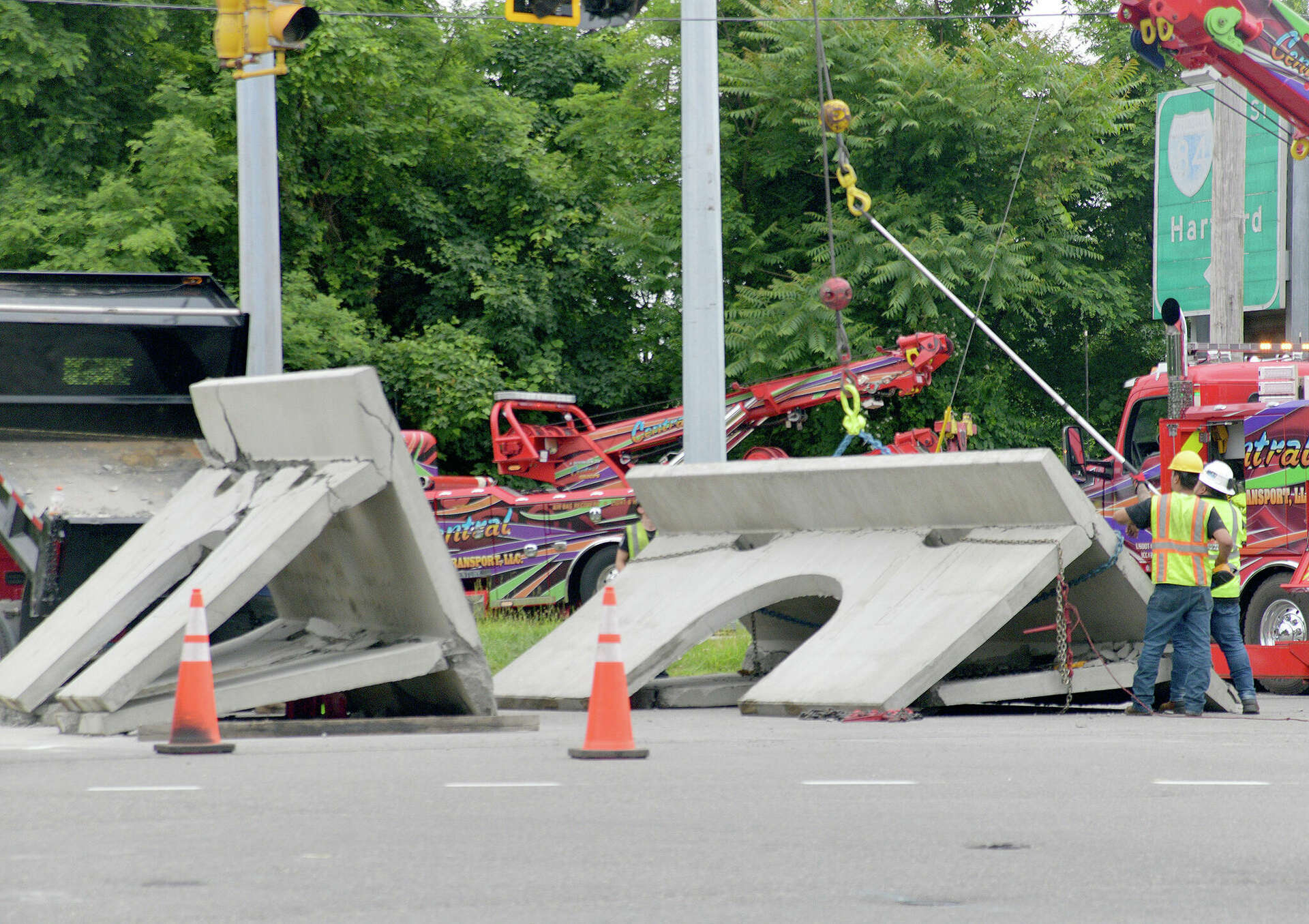 Concrete slabs falls off truck in Manchester, driver cited, police say
