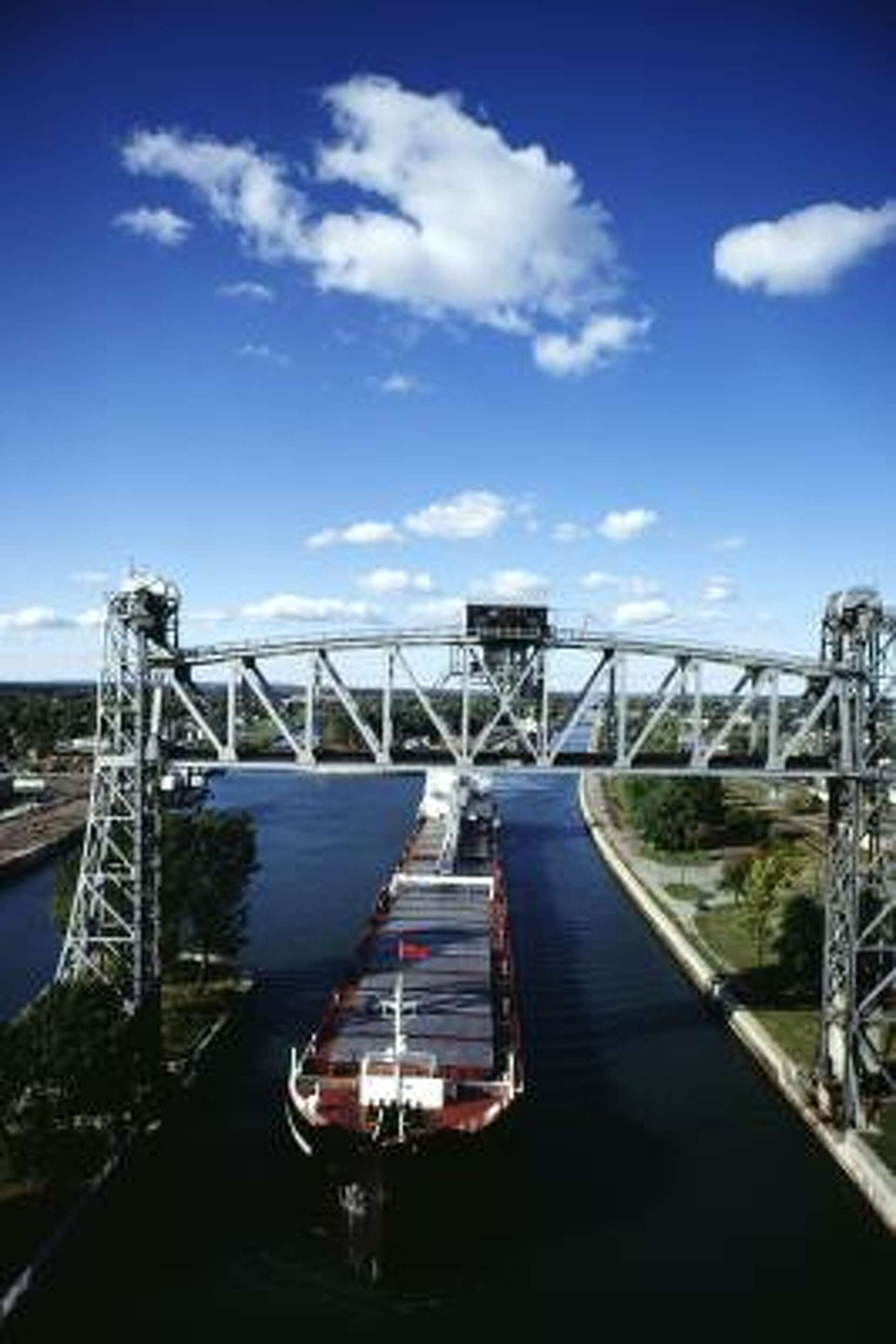 How Does a Steel Ship Float Using Archimedes' Principle?