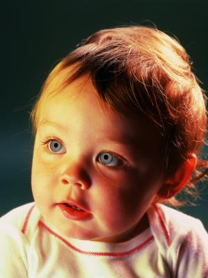 How Is an Infant a Metaphor to Jonas in "The Giver"?