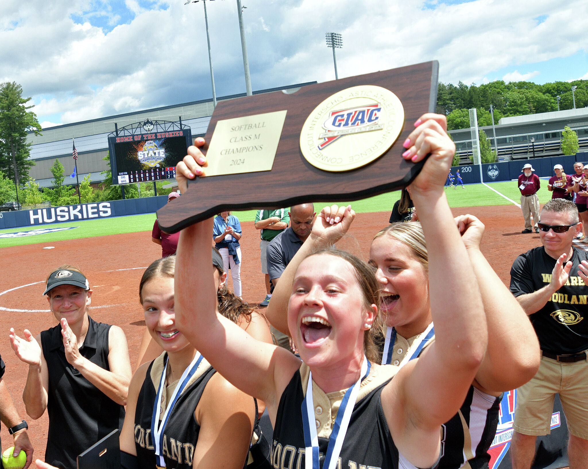 Woodland routs Sheehan, wins third straight Class M softball title