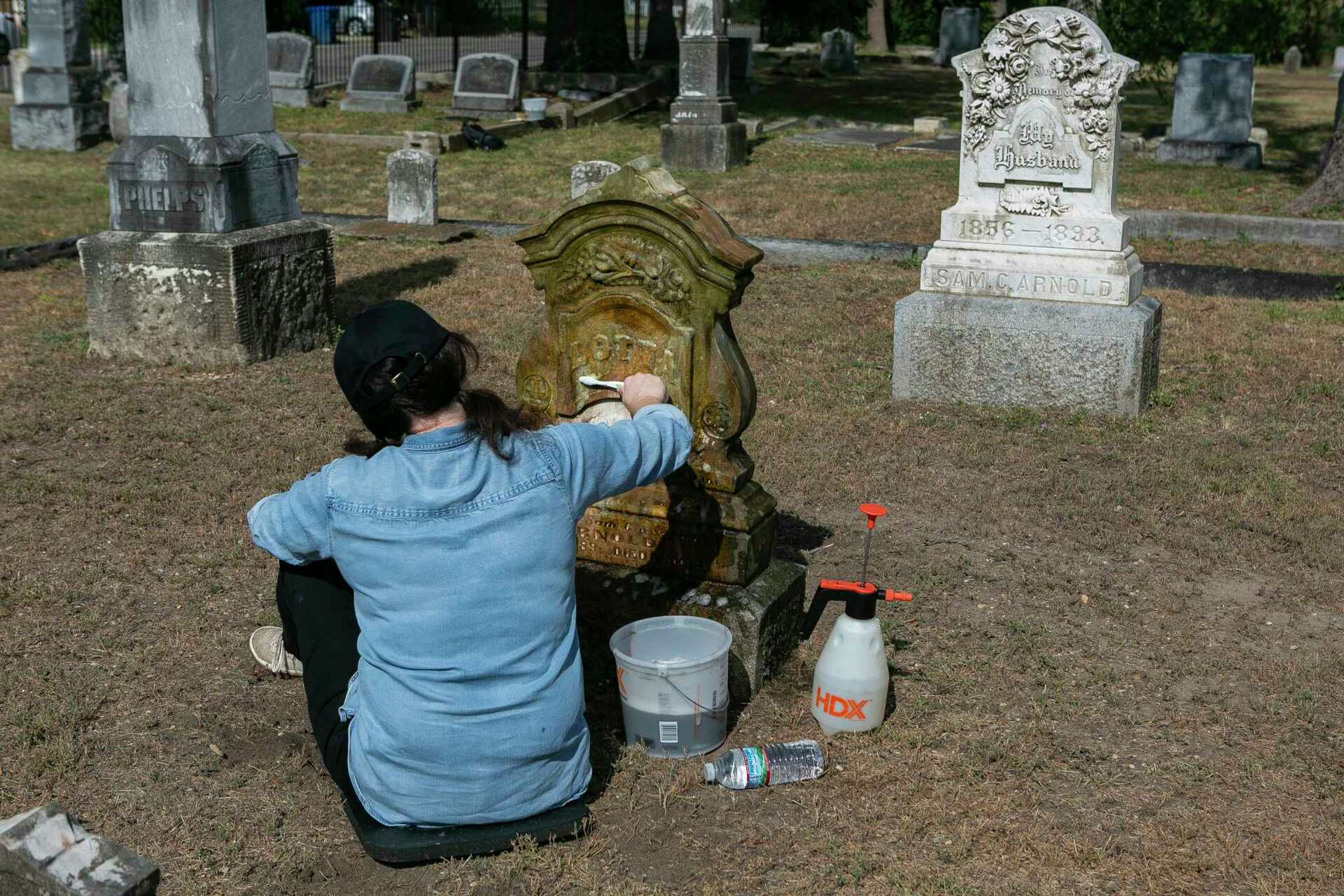 San Antonio volunteers clean, document 100-plus-year-old headstones