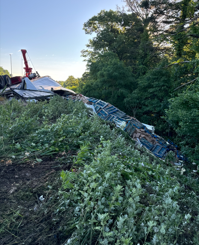 Truck driver cited after cheese truck rollover on I-84 in Cheshire
