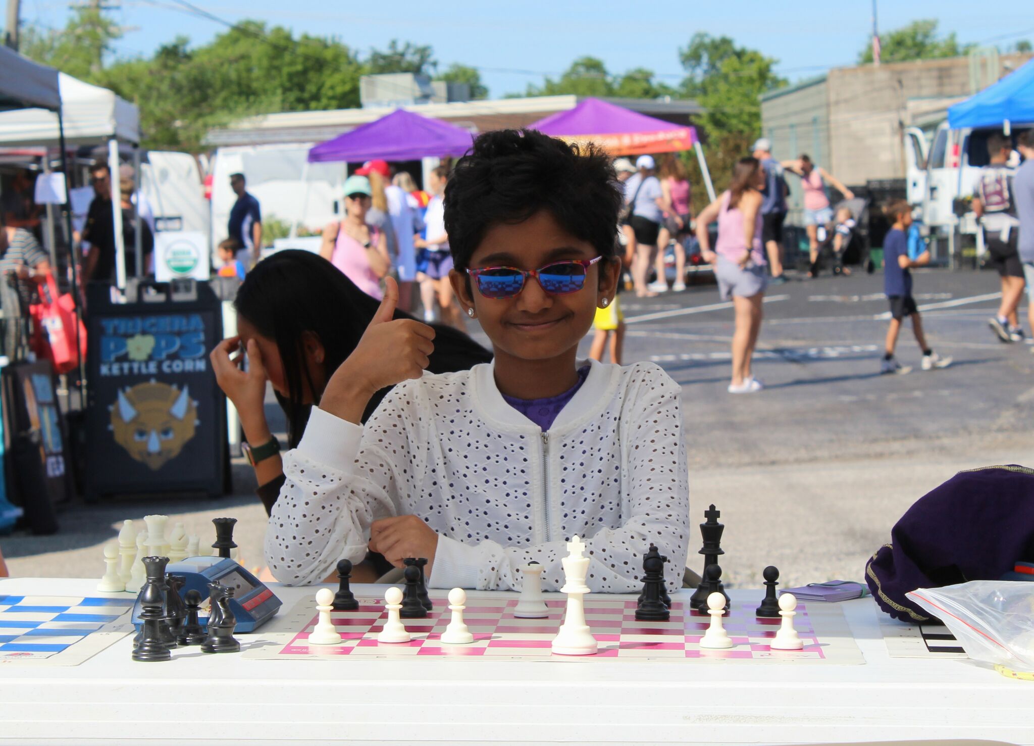 Chess prodigy visits Edwardsville IL Goshen Market