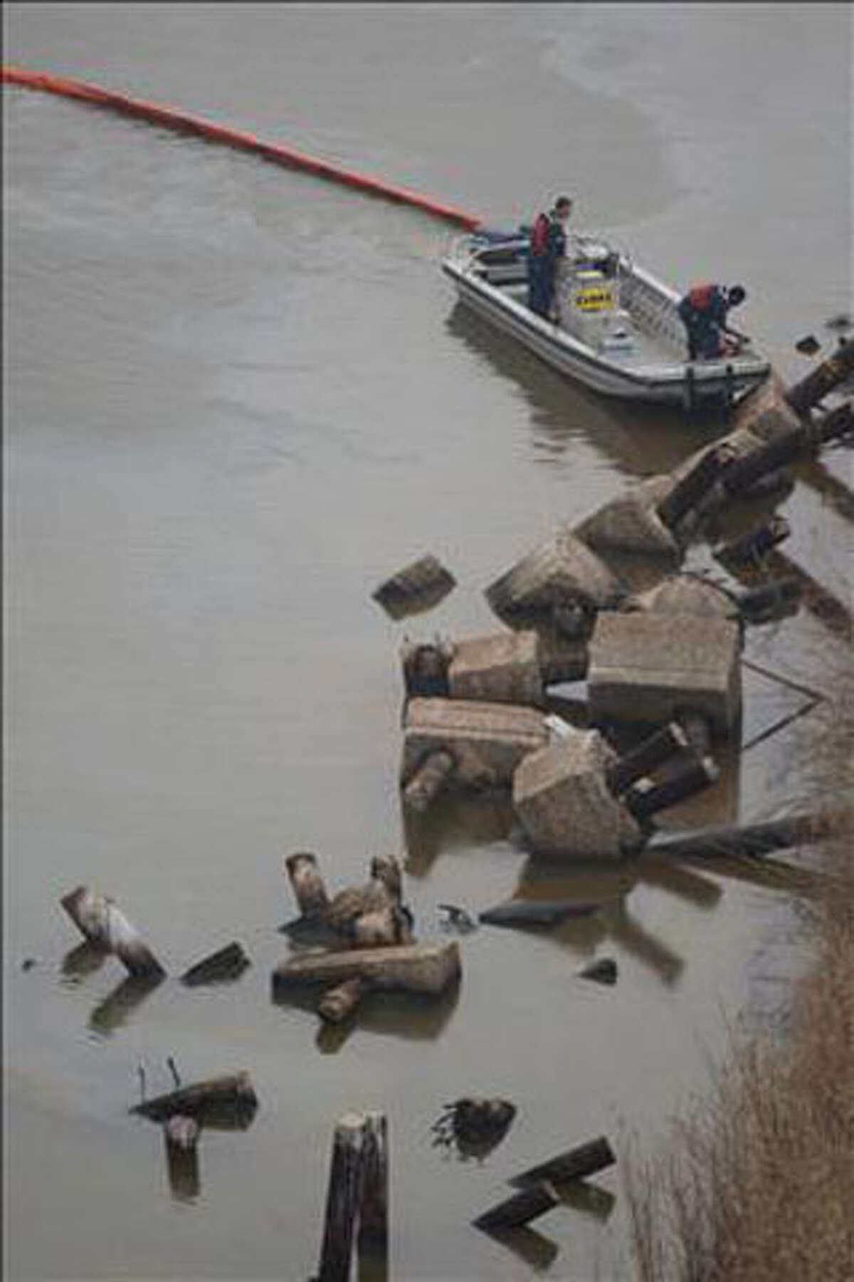Tanker, Barge collision closes waterway, spills oil