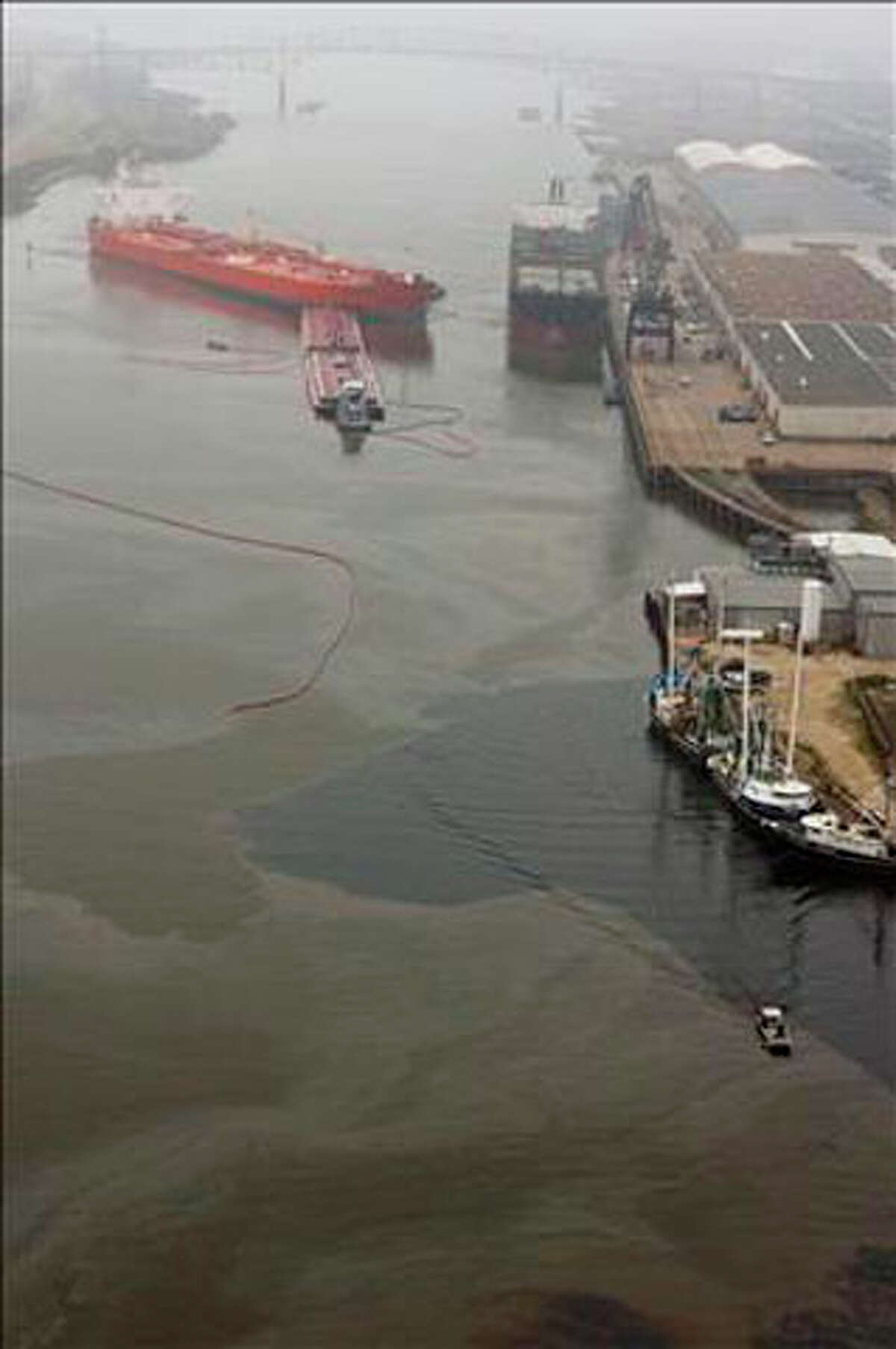 Tanker, Barge collision closes waterway, spills oil