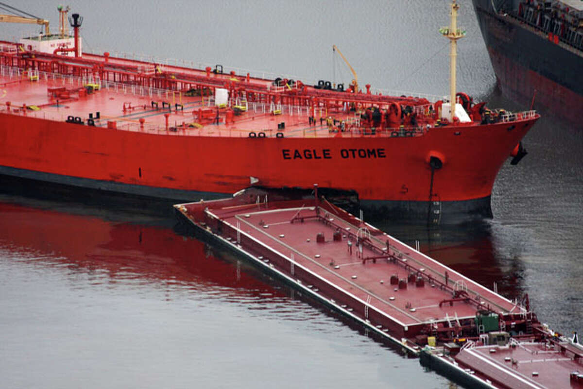 Tanker, Barge collision closes waterway, spills oil