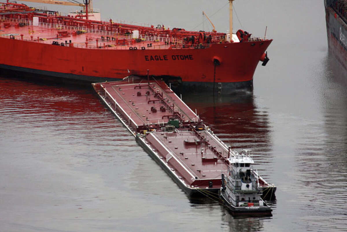 Tanker, Barge collision closes waterway, spills oil