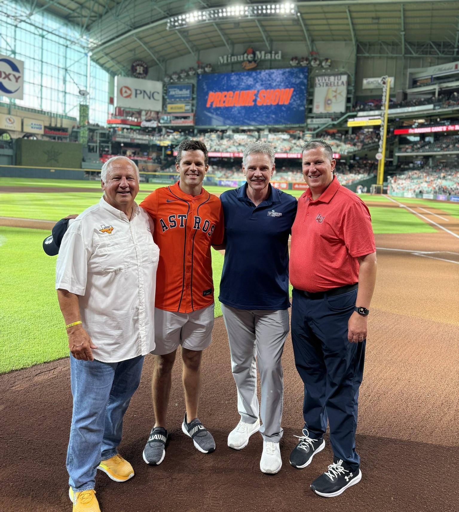 Lamar University baseball coach throws first pitch at Astros game
