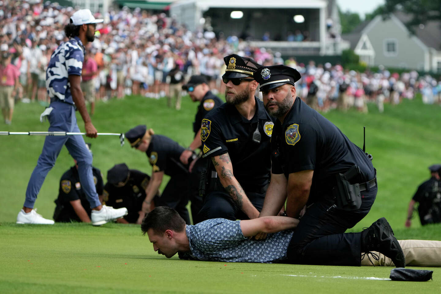 Protesters disrupt Travelers Championship on 18th hole in Connecticut