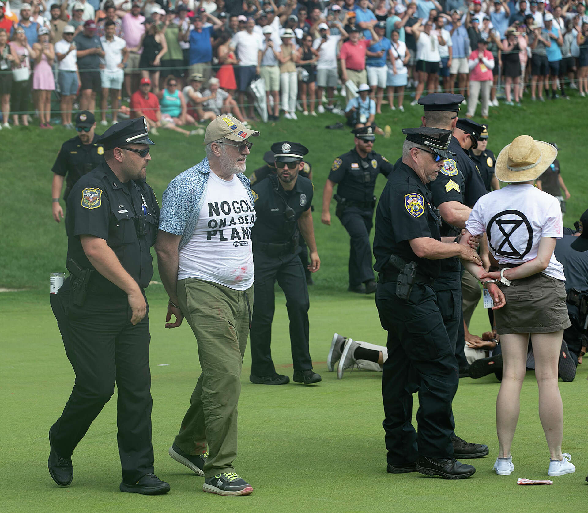 Protesters disrupt Travelers Championship on 18th hole in Connecticut