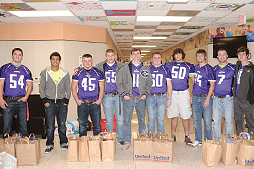 CHS football players continue tradition of community giving