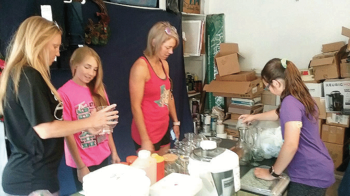 Triangle Realty agents achieve success with garage sale promotion