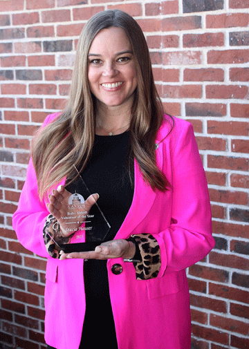 HEART FOR GIVING: Hauser receives 2021 Volunteer of the Year Award