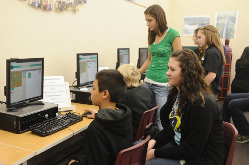 Fourth graders learn about computer code and programming