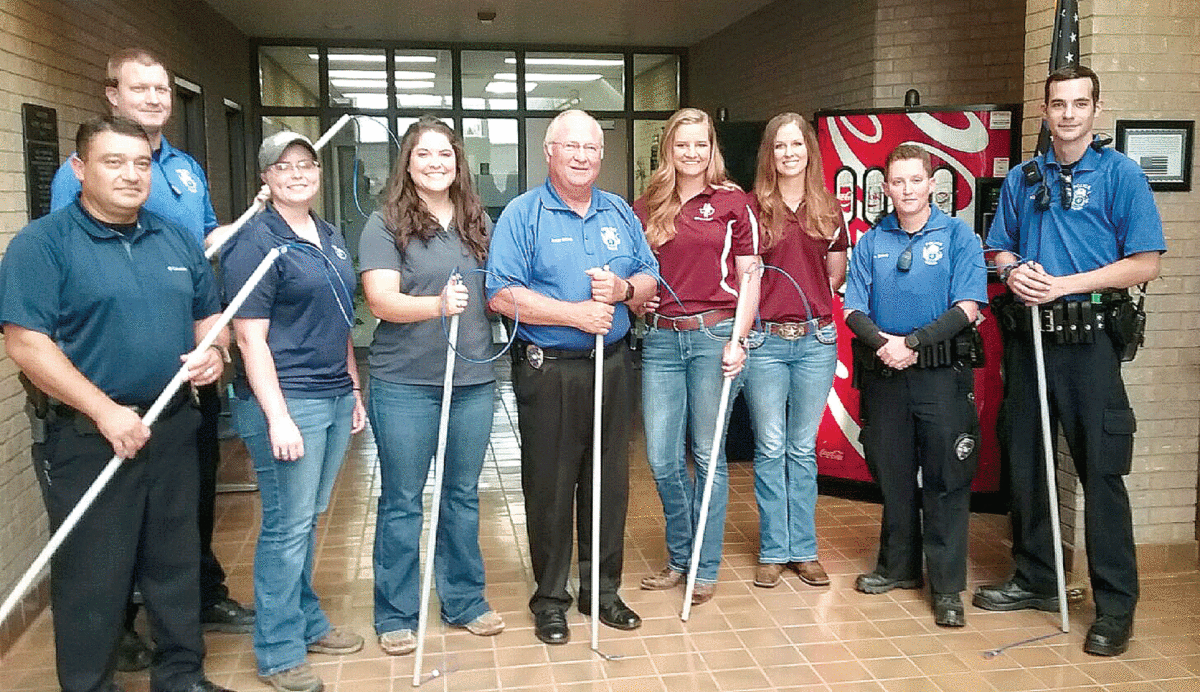 Texas A&M vet students donate catch poles to Canyon Police Department