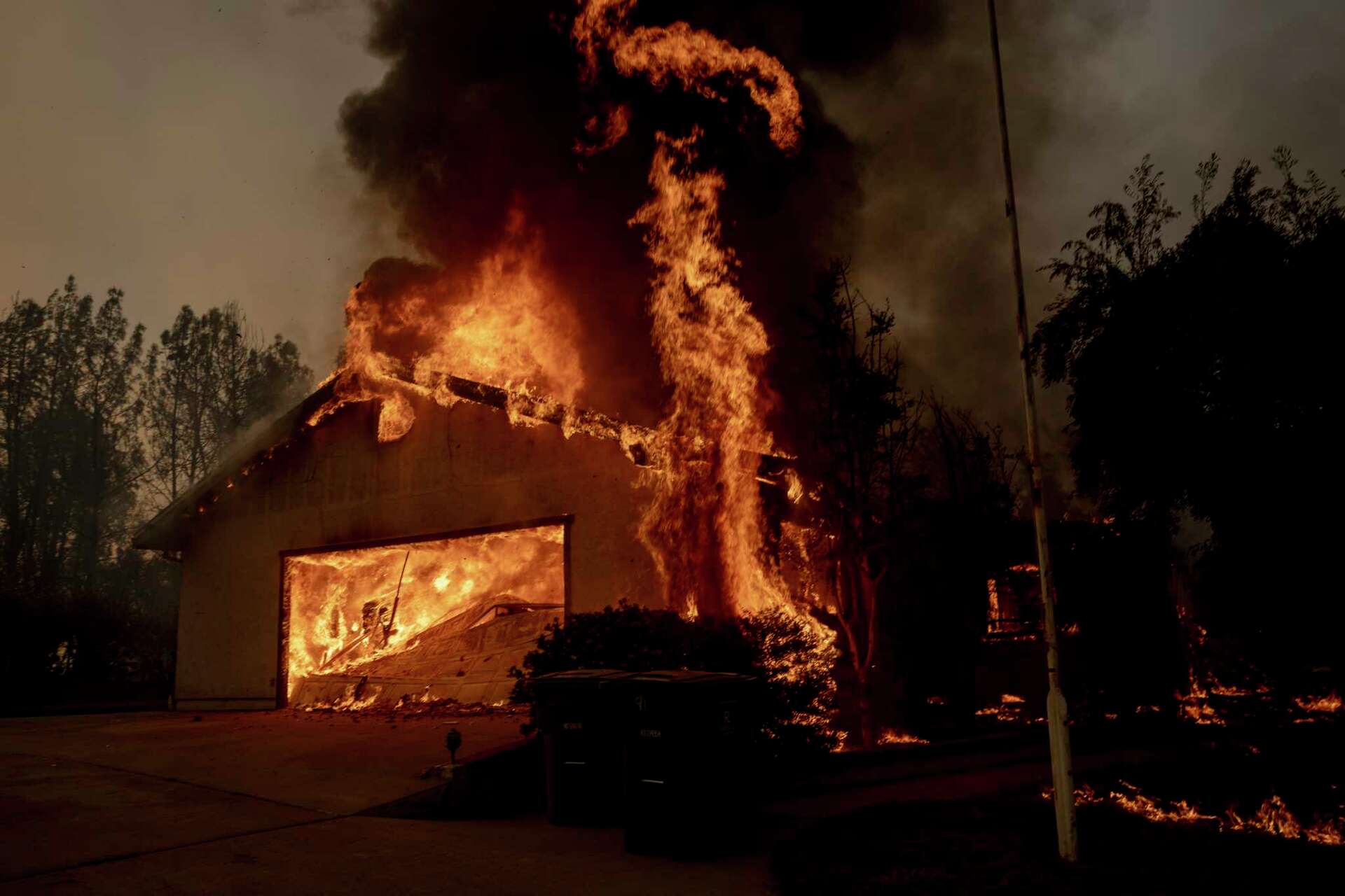 Thompson Fire burns homes, forces 13,000 evacuations in Butte County
