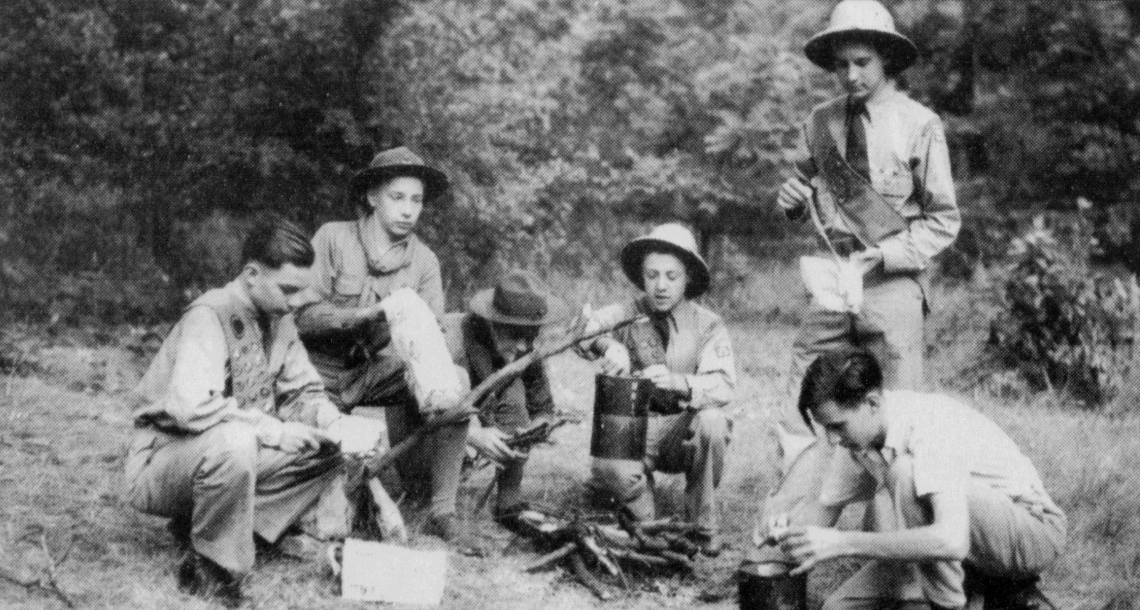 Boy Scouts enjoy tin can cookery at Camp Warren Levis in Godfrey