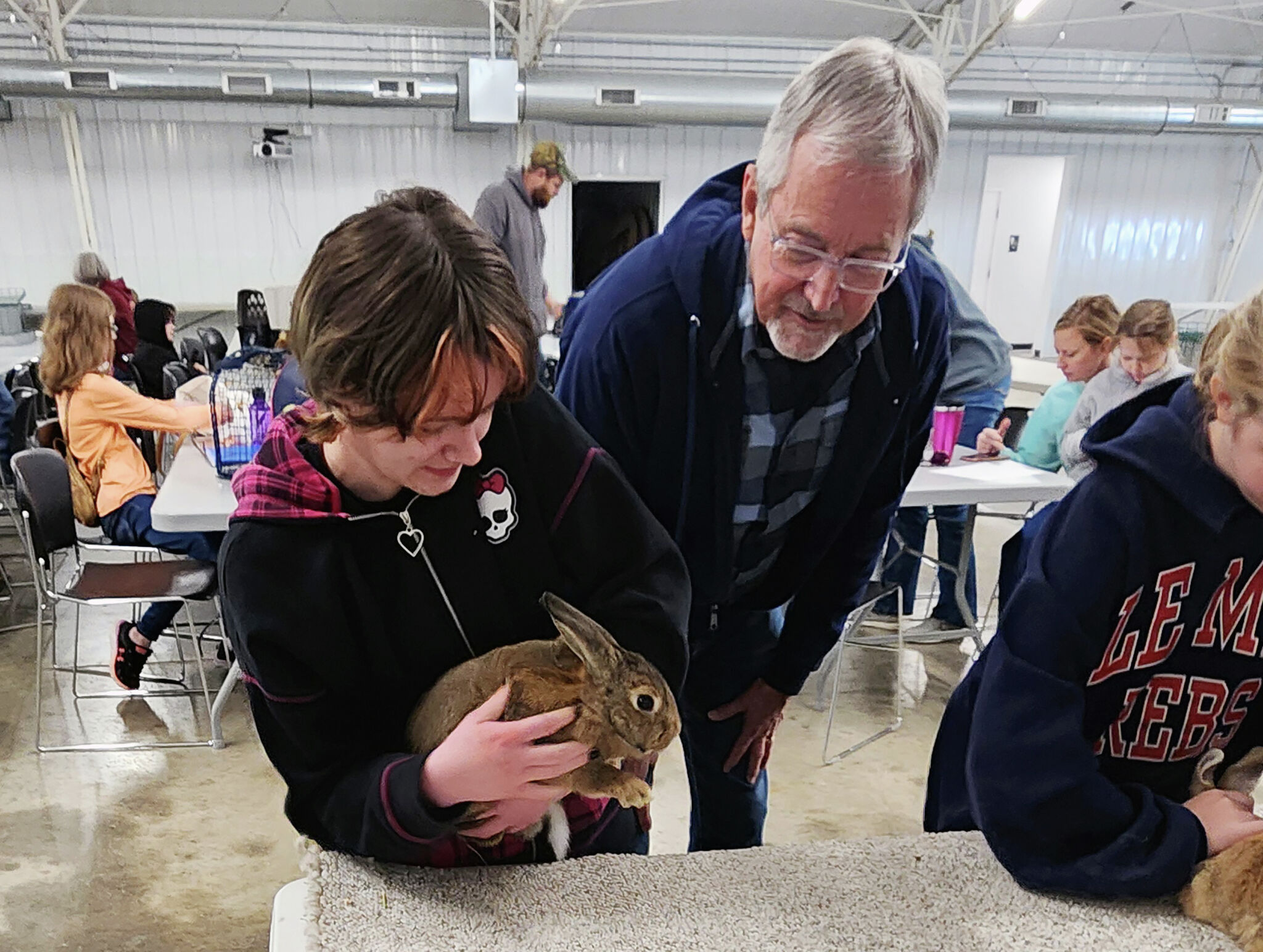 Hopping to it: Some in Morgan fair's rabbit show get hands-on help