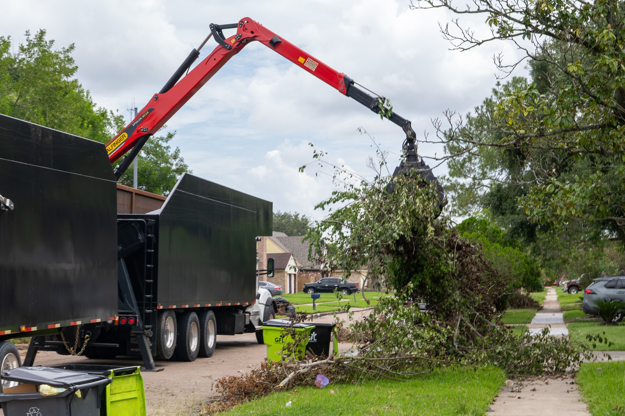 How Houston suburbs are cleaning up millions of trees downed by Beryl