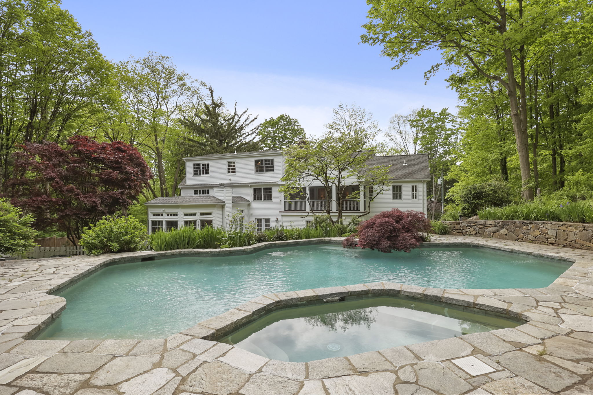 Renovated colonial, with pool, gardens and prime location
