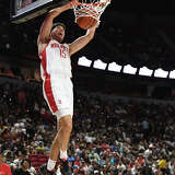 After being at death's door, Houston basketball legend Dwight Jones ...