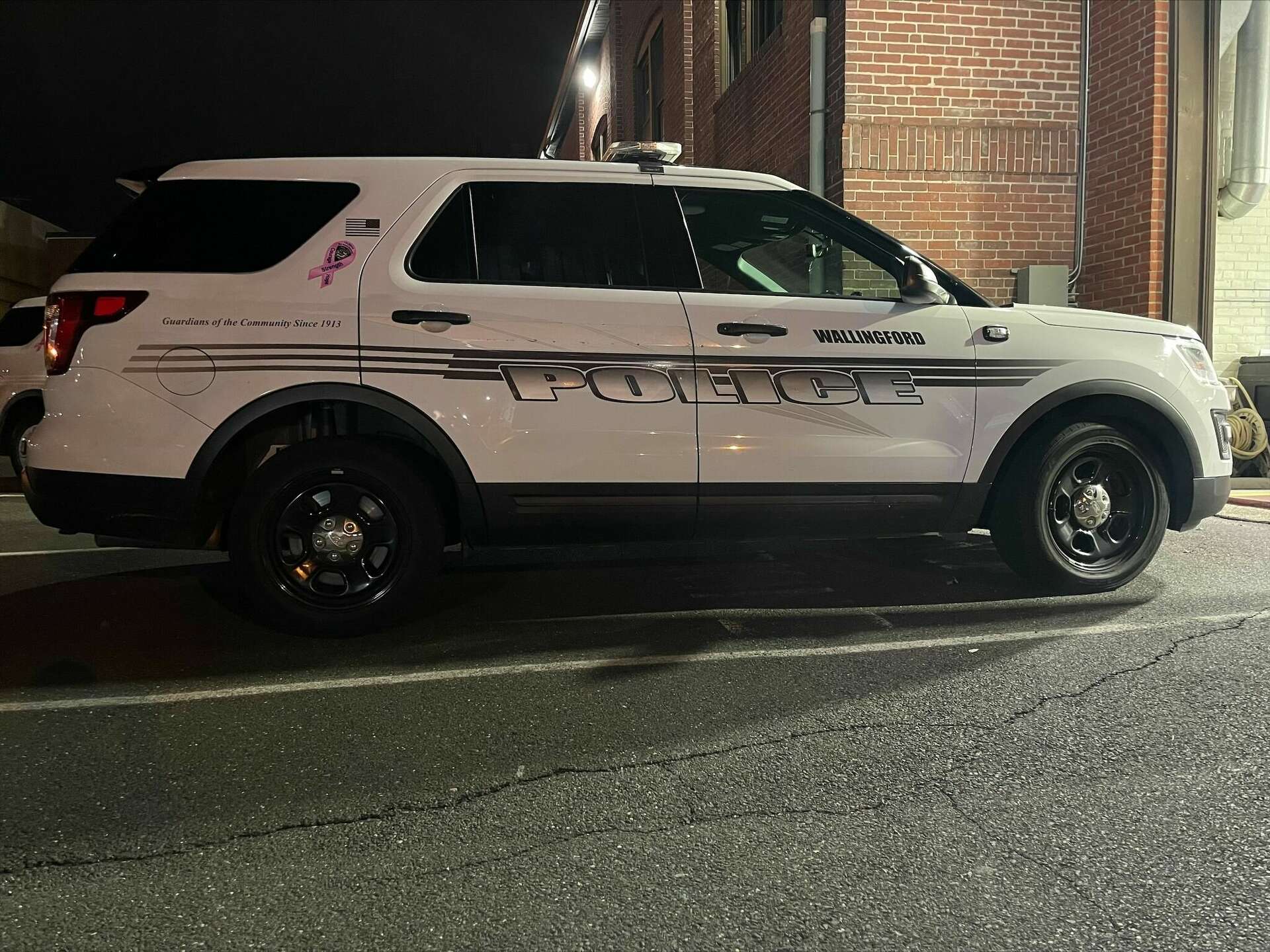 Video shows Wallingford woman speeding with man on car's hood: Police