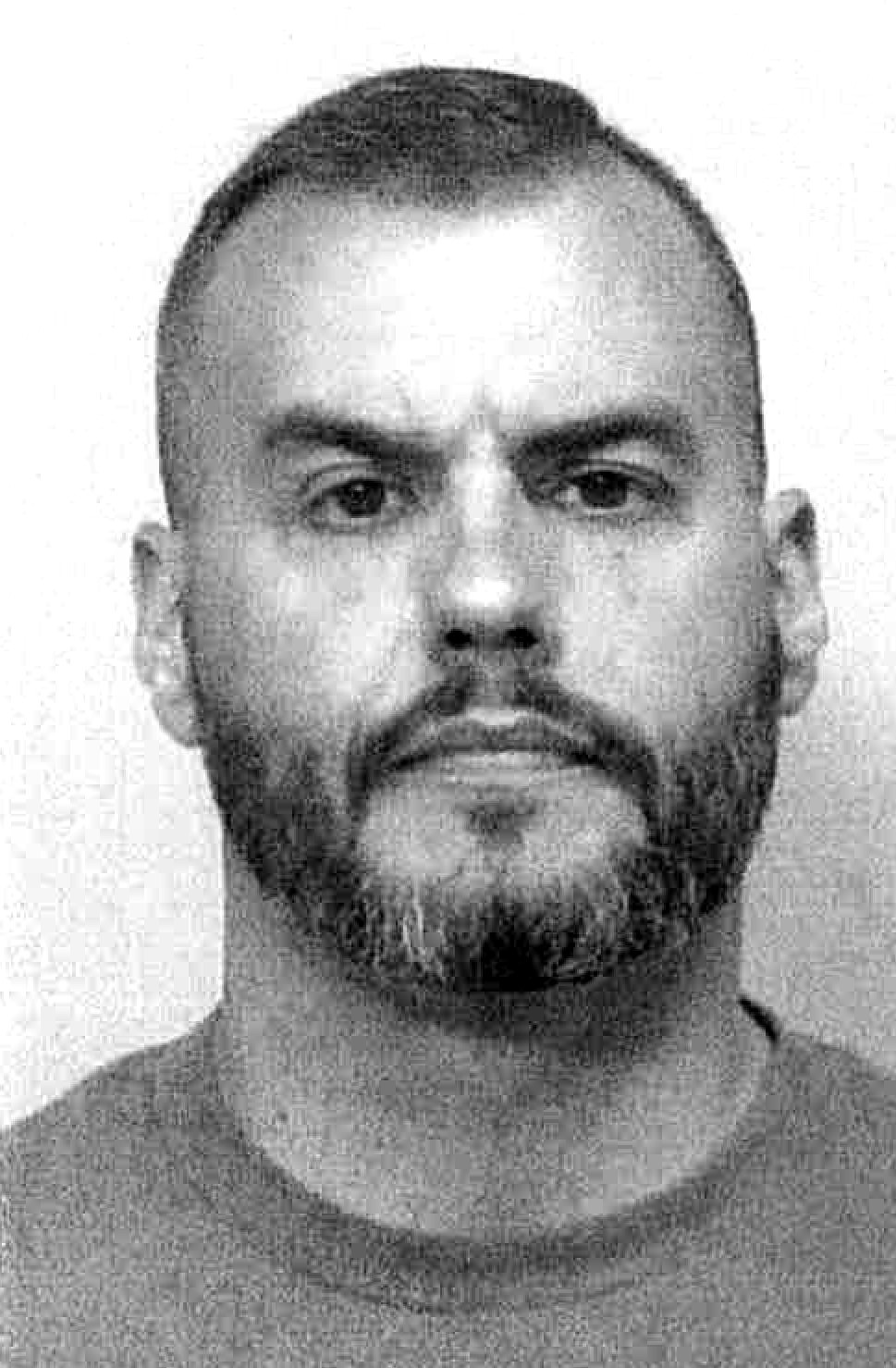 Alton police officer accused of theft, wire fraud turns himself in