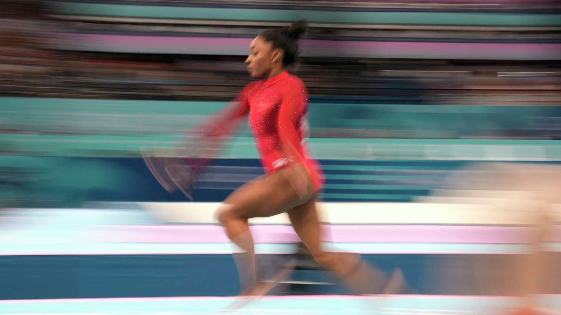 Simone Biles performs her signature vault to win third gold in Paris