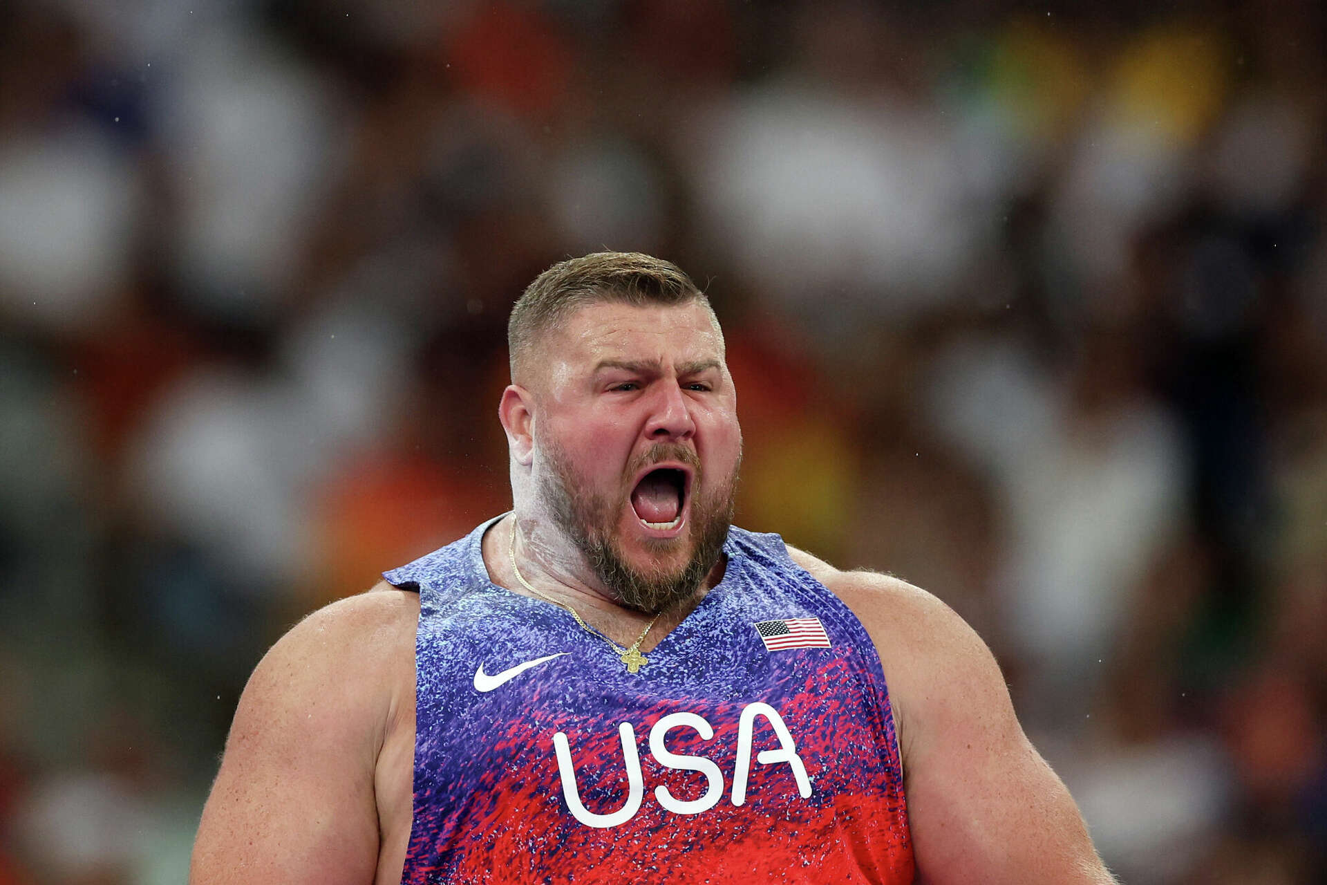 Ryan Crouser sets Olympic record with third consecutive shot put win
