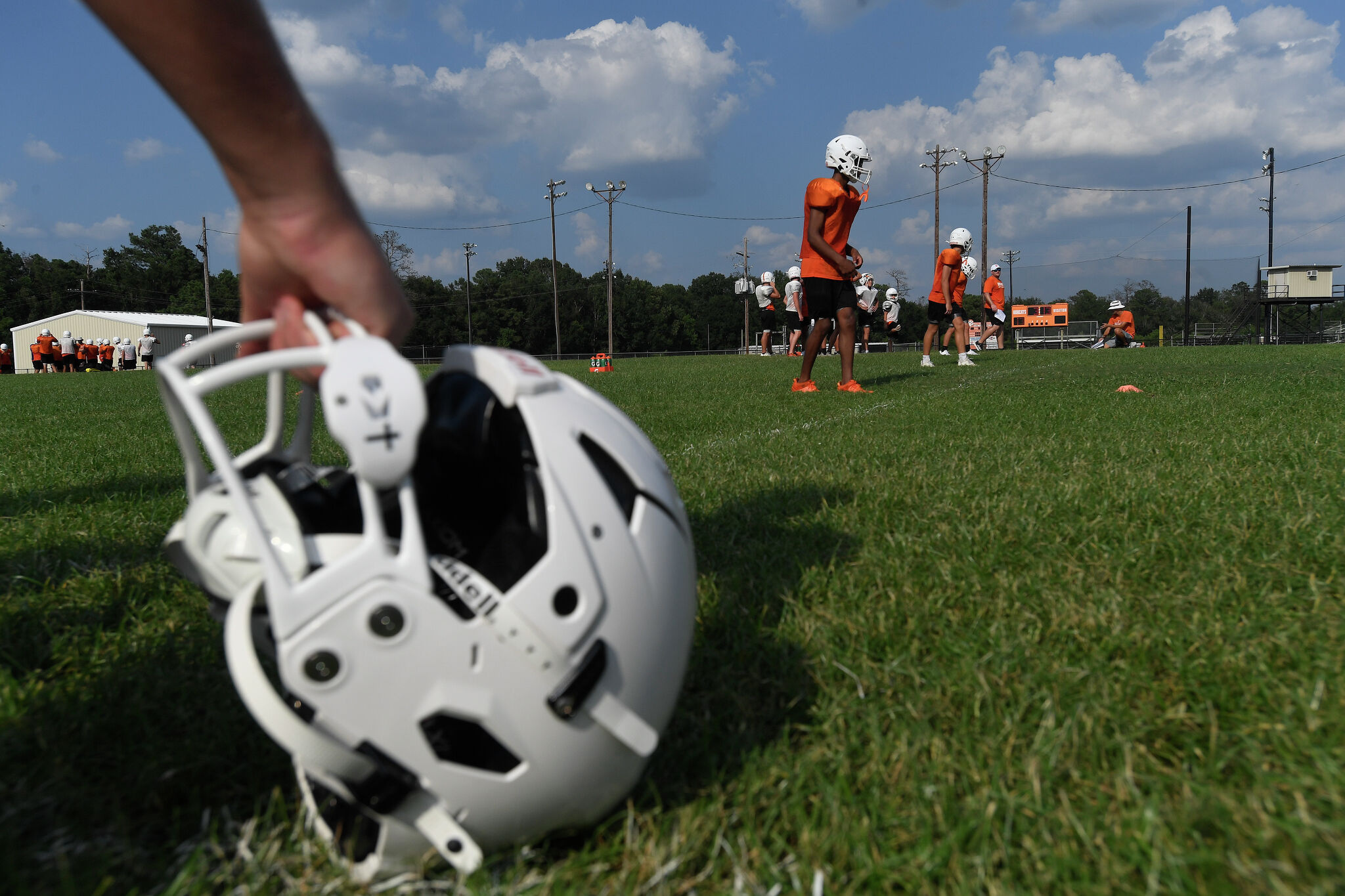 The Orangefield Bobcats and new coach get ready for football start