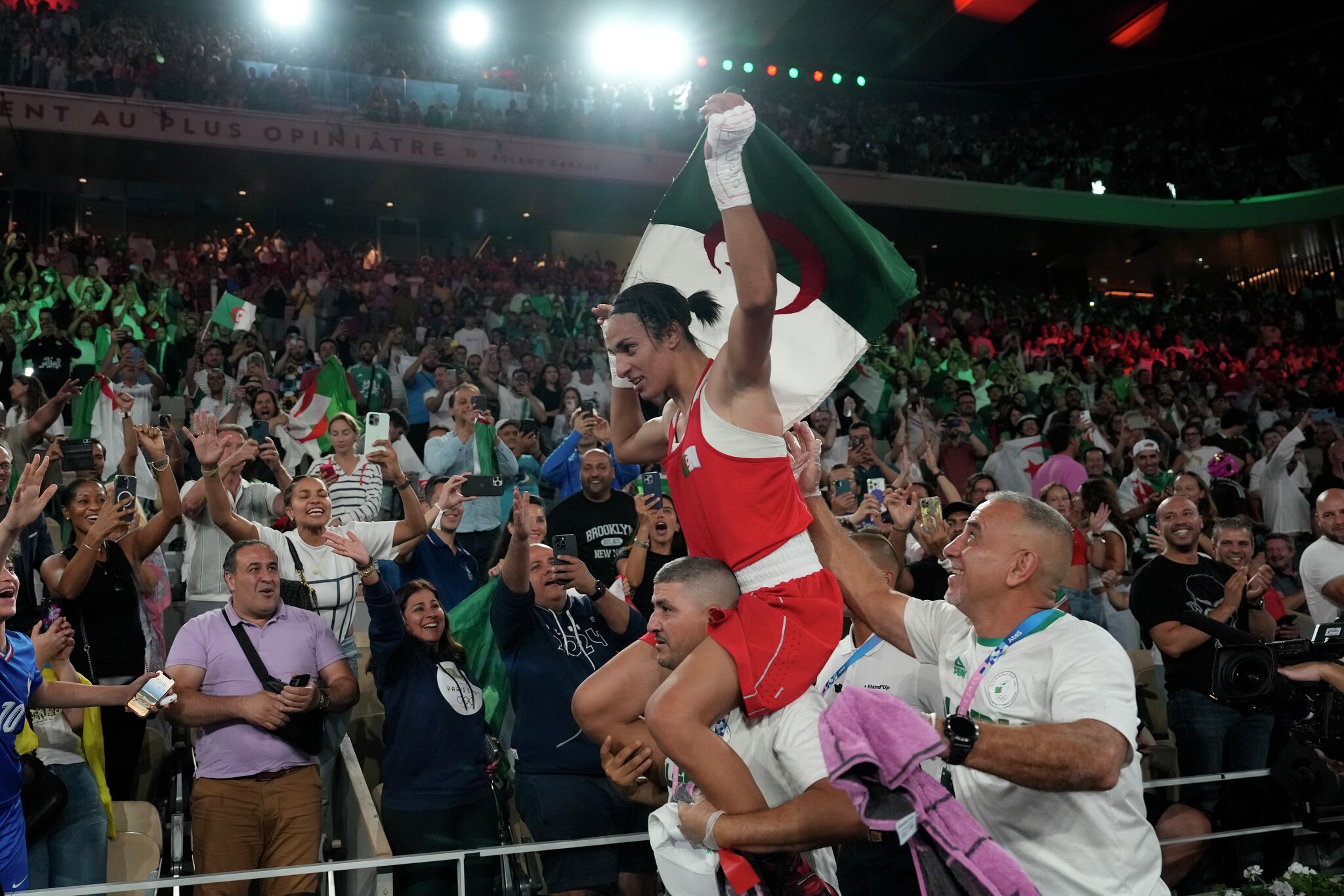Imane Khelif wins Olympic boxing gold, rises above attacks ‘a heroine’