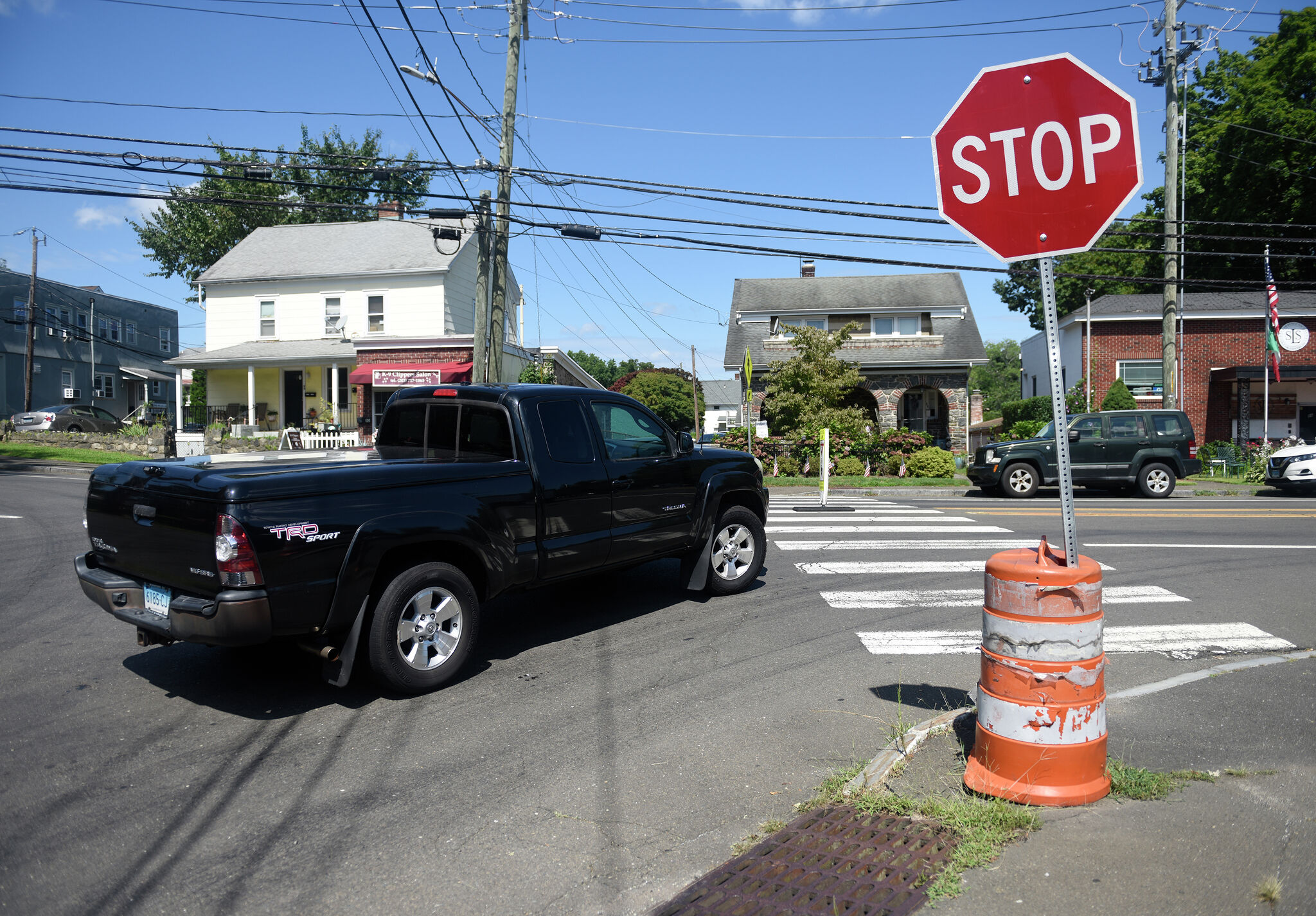 Greenwich store owners say adding stop signs will hurt business