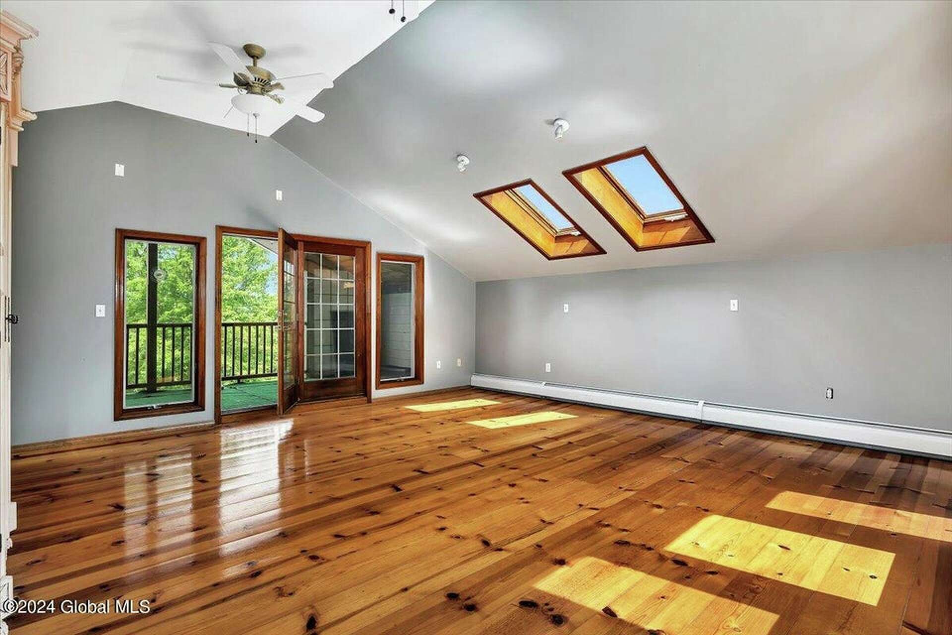 Custom Poestenkill home in Averill Park schools listed under $500,000