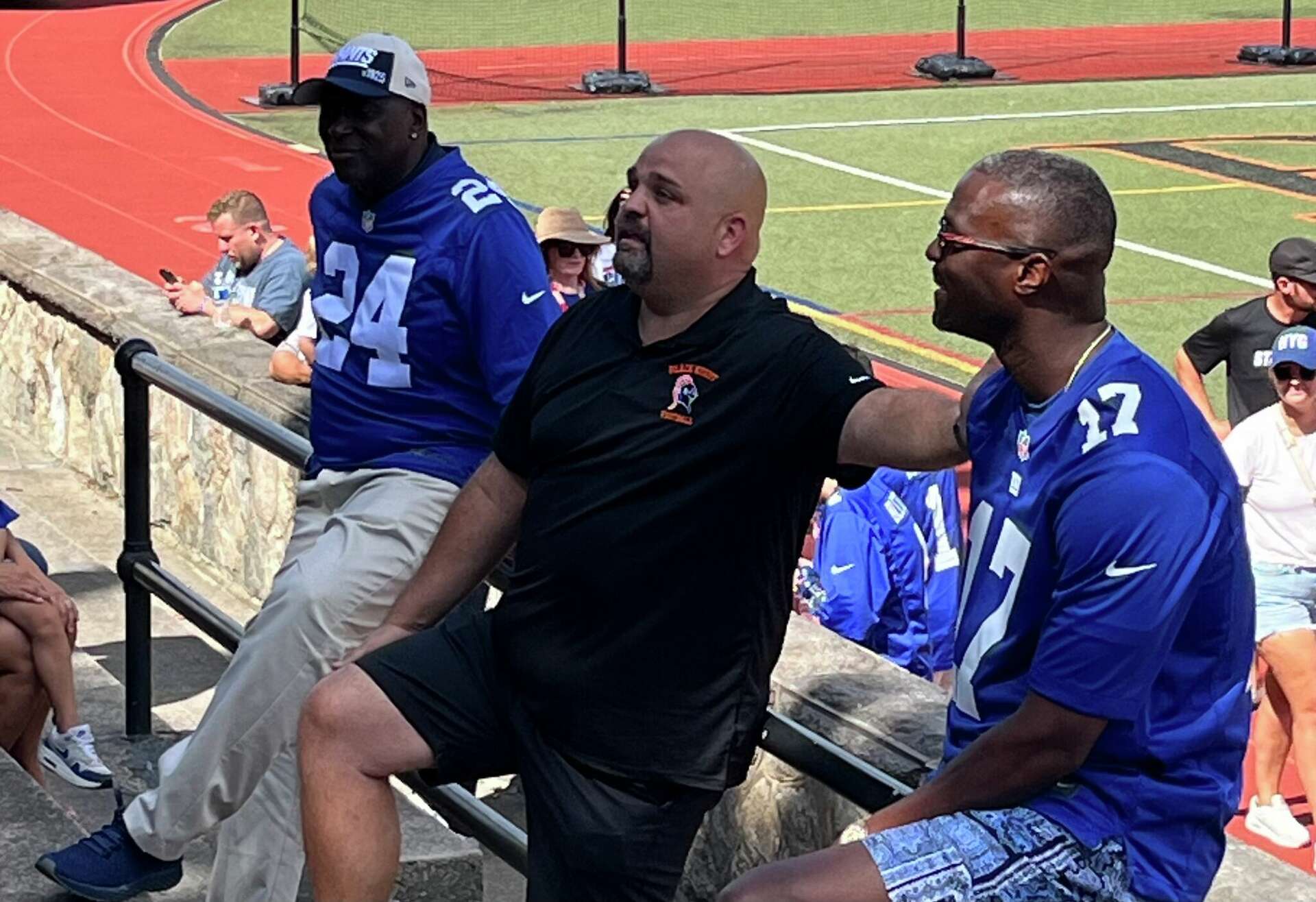 Plaxico Burress, O.J. Anderson donate shoulder pads to Stamford High