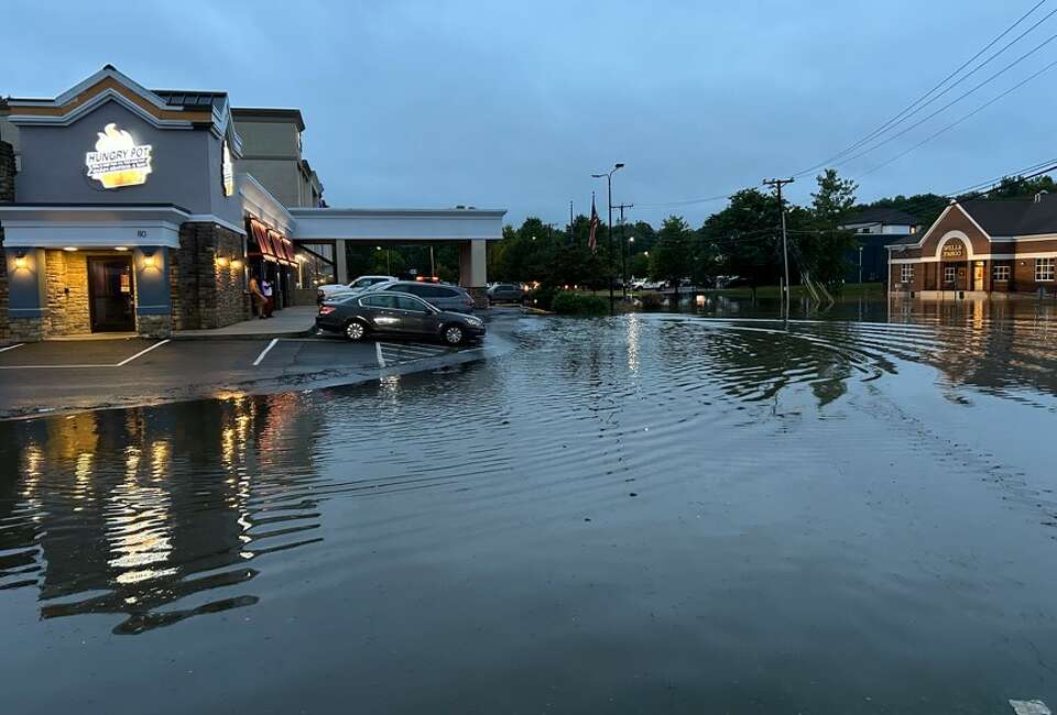 Flash flooding in CT causes road washouts, evacuations, missing people