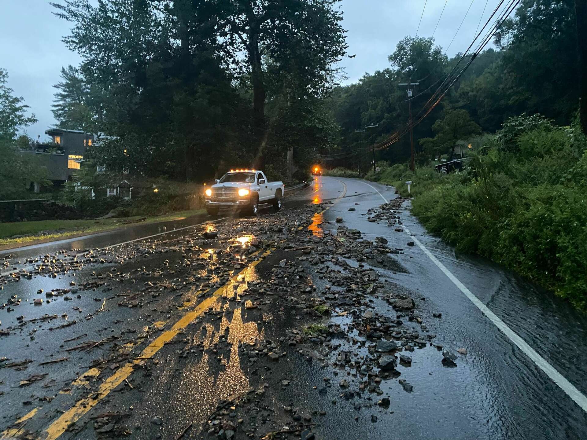 Flash flooding in CT causes road washouts, evacuations, missing people