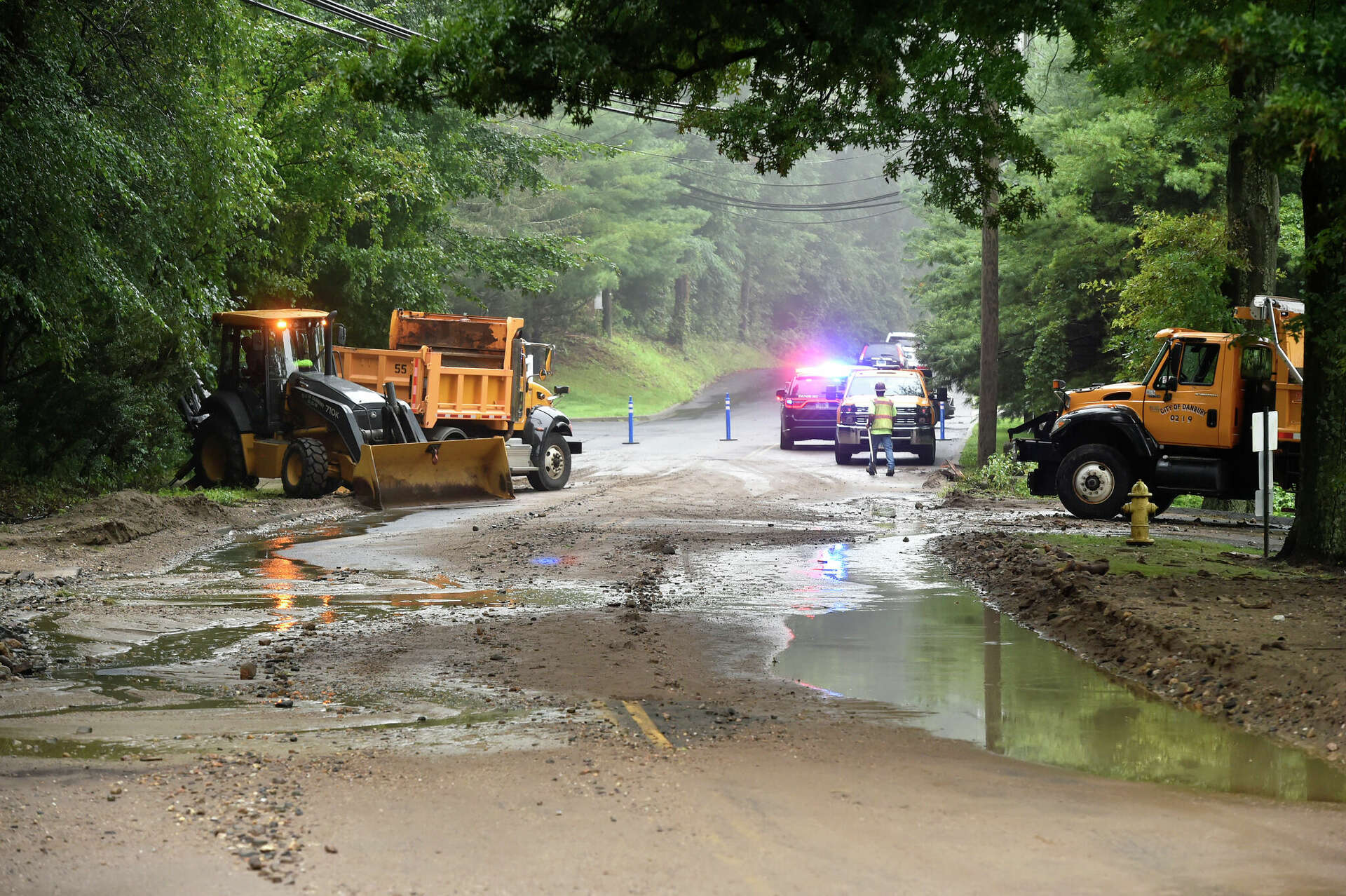 CT floodwaters killed 2 people, destroyed roads: Live updates