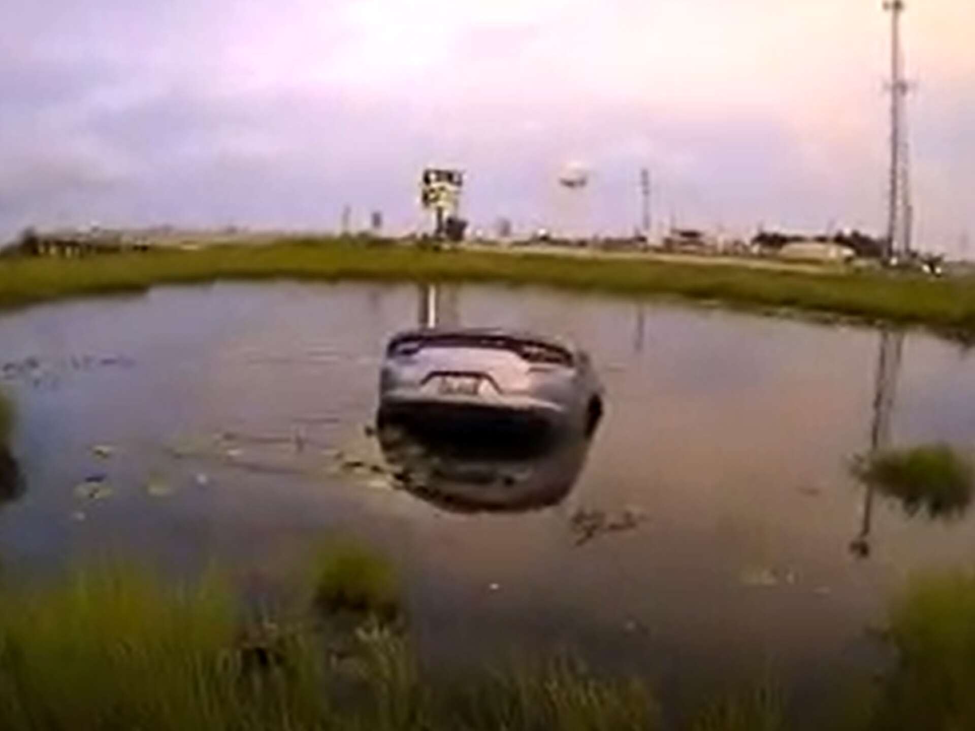 Bodycam shows watery rescue of Texas mother from sinking car