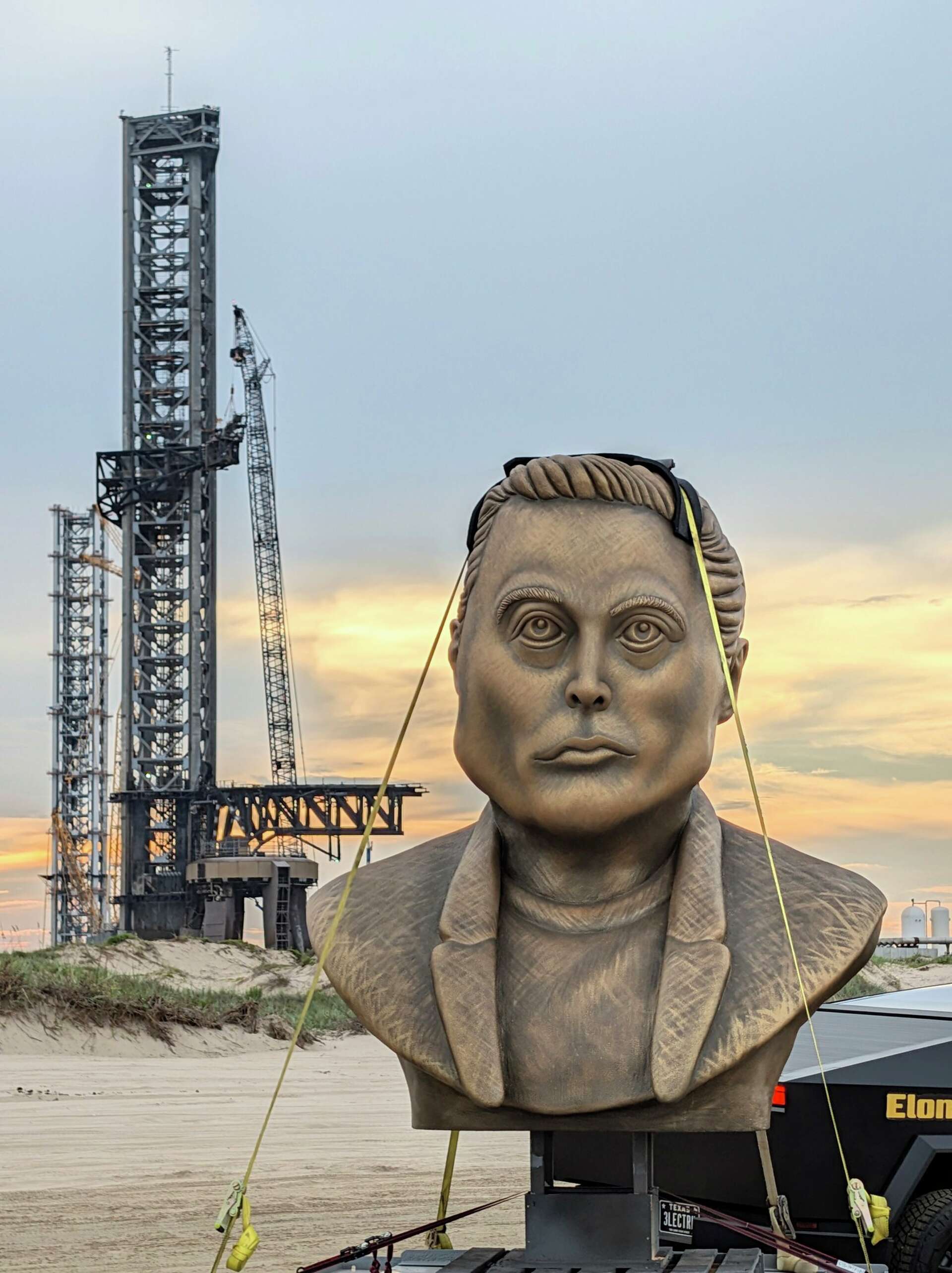 Giant Elon Musk bust raises questions as it's towed across South Texas