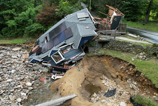 Oxford mom watched house fall apart in CT floods before it collapsed