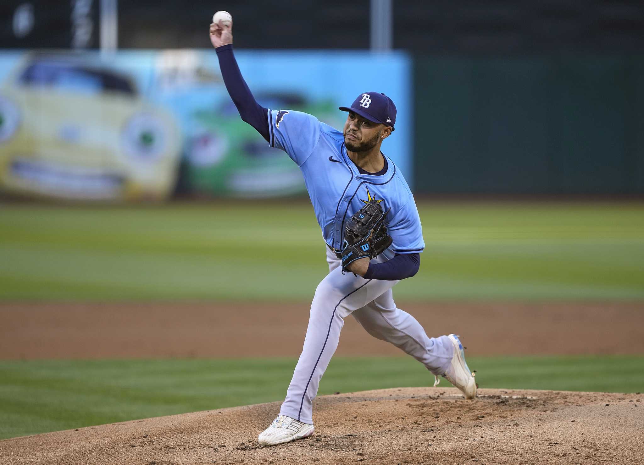 A’s Lawrence Butler gets the best of friend Taj Bradley of the Rays
