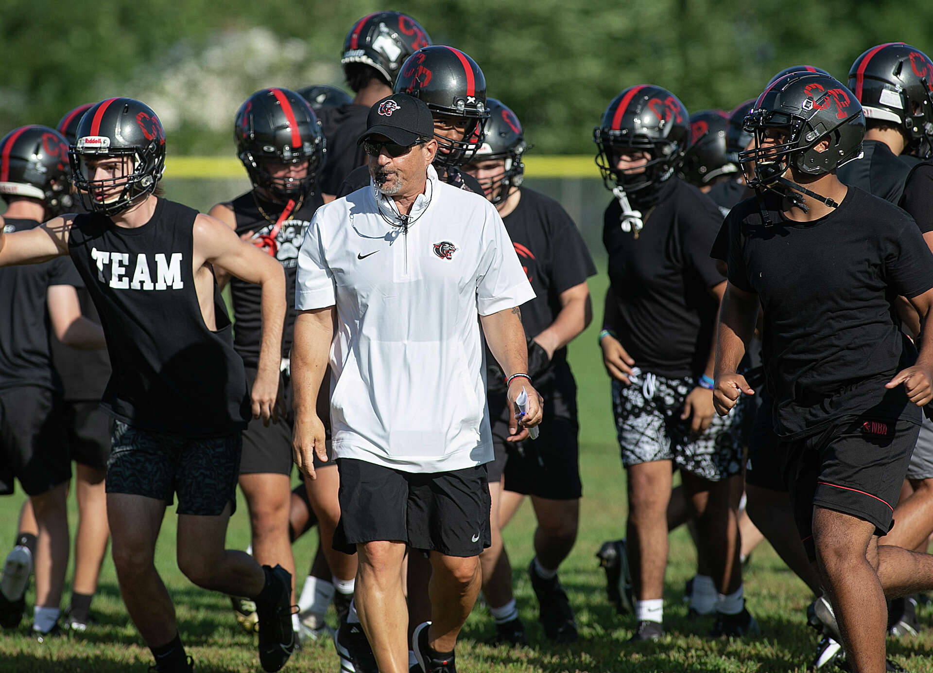 Sal Morello back coaching the Cromwell football program he established