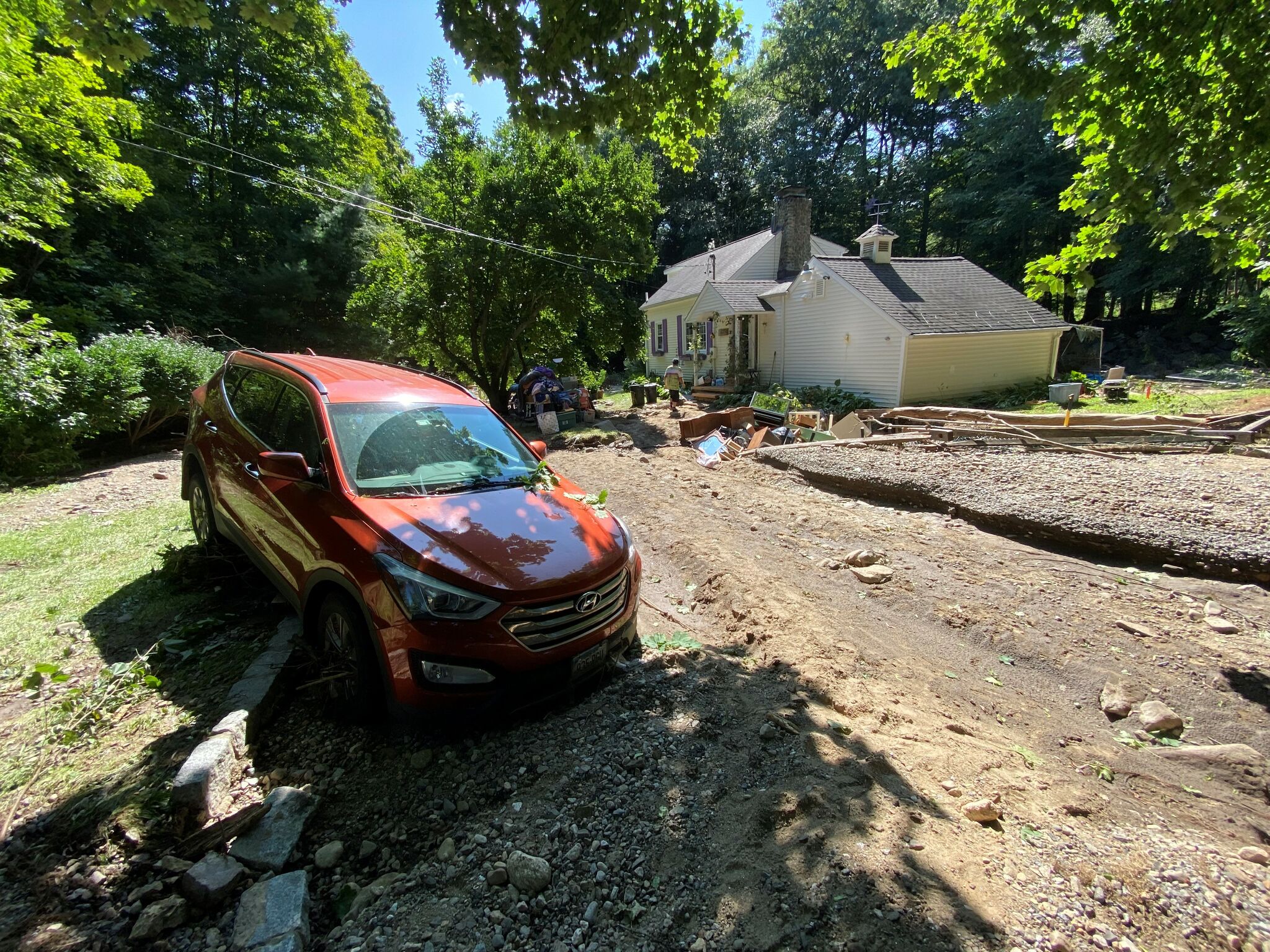 Connecticut storm turned placid Newtown brook into destructive river