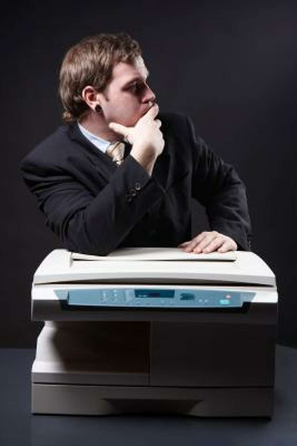 What Is the Difference Between a Scanner & a Copier?