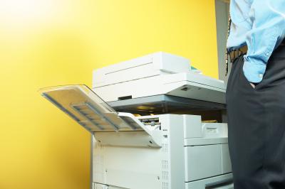 How to Print Invoices in a Laser Printer With the Customer Copy